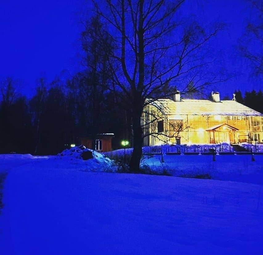 A Traditional Swedish Log Cabin Encased In A Green House Allows A ...